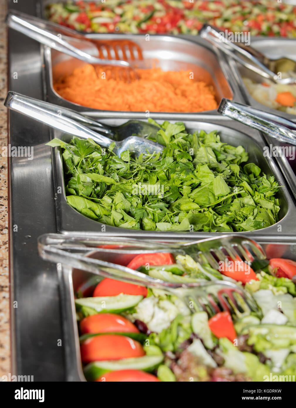 chef standing behind full lunch service station Stock Photo - Alamy