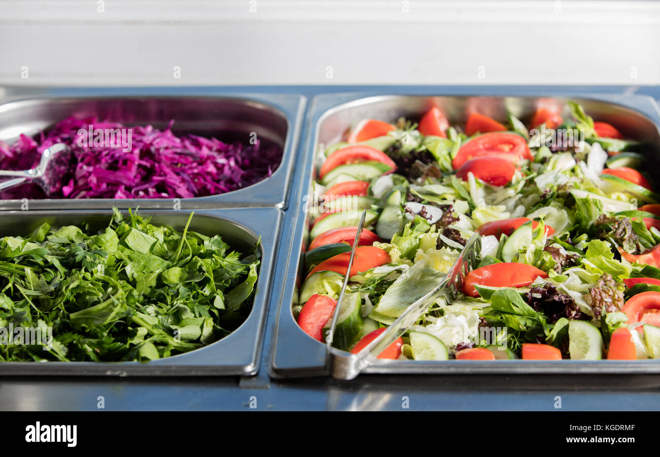 chef standing behind full lunch service station Stock Photo - Alamy