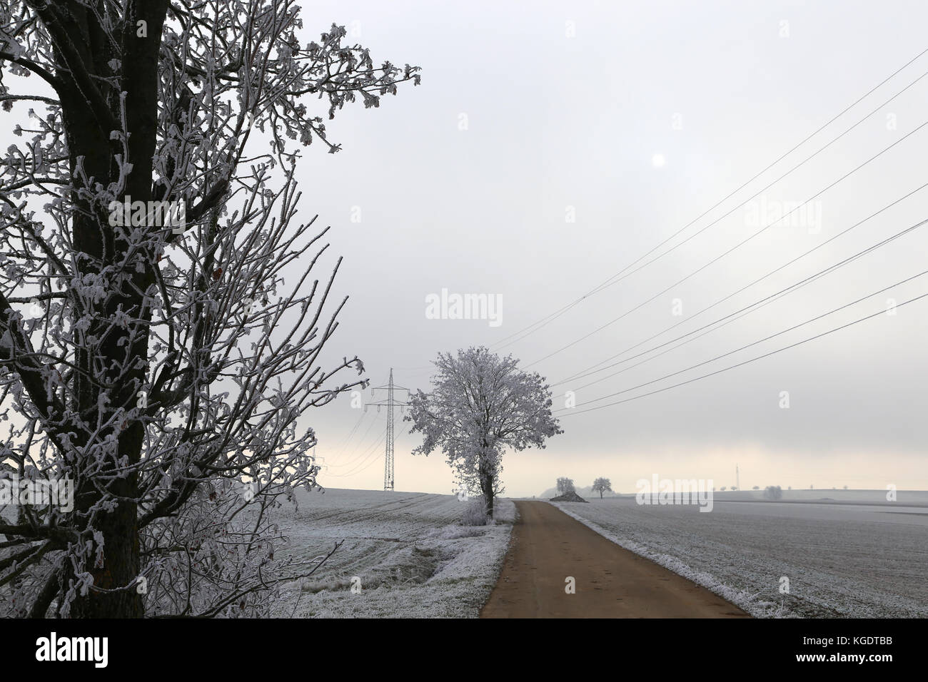 Winter landscape. Fields covered with the first snow Stock Photo - Alamy