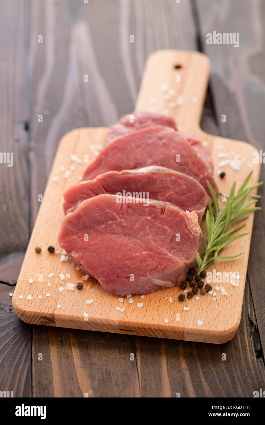 fresh raw angus on wooden board Stock Photo - Alamy