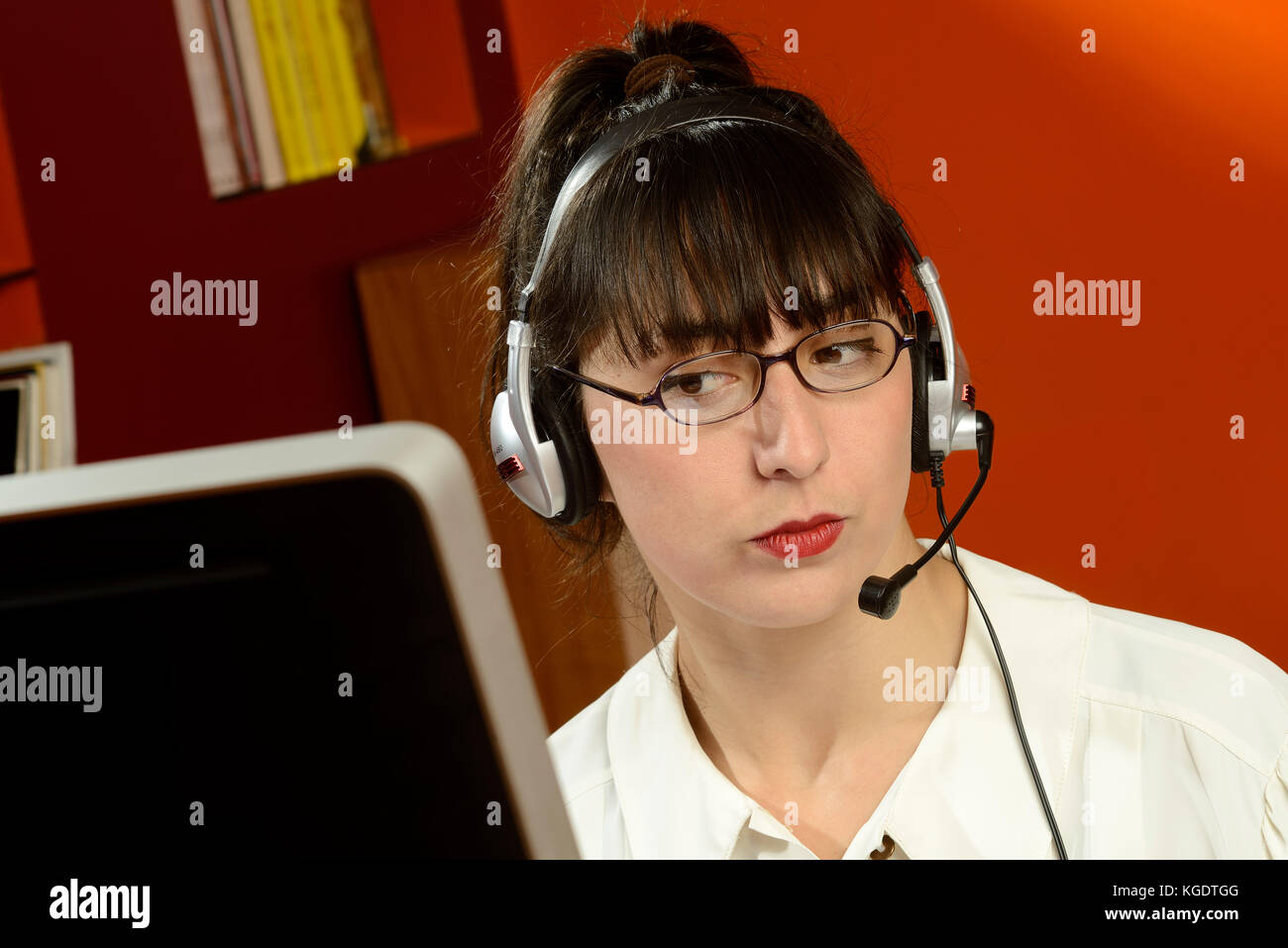 Woman wearing headset hi-res stock photography and images - Alamy