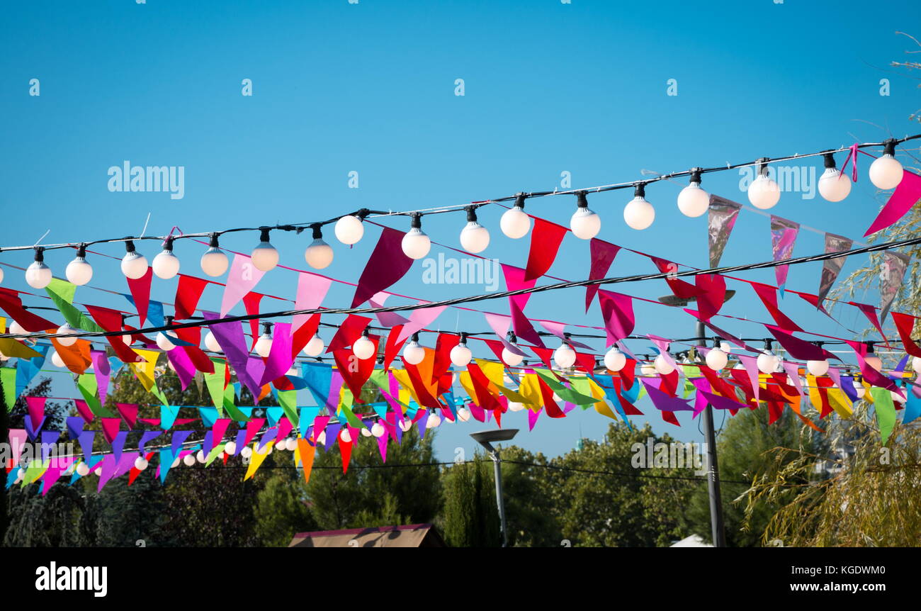 Colorful flags and lamps during celebrations Stock Photo - Alamy