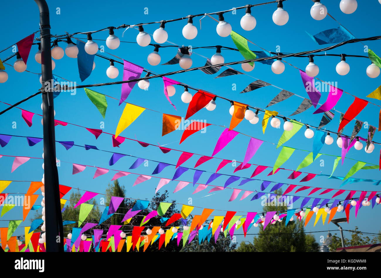 Colorful flags and lamps during celebrations Stock Photo - Alamy