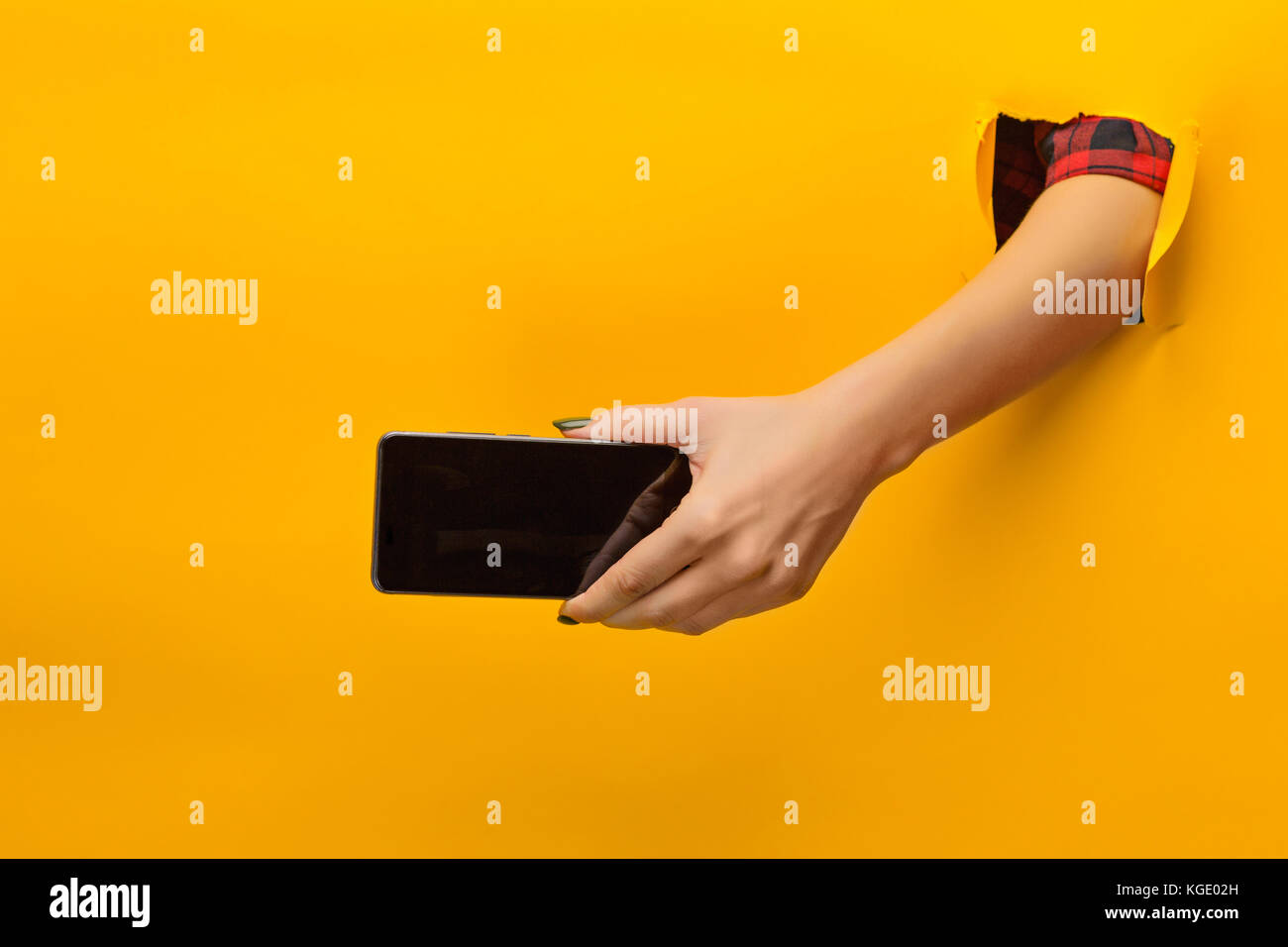 female teen hands using phone with black screen, isolated Stock Photo ...