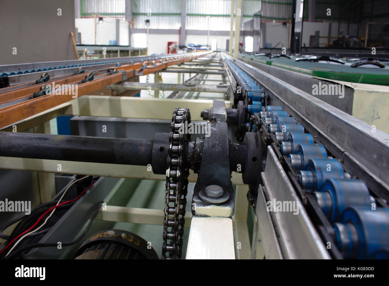 The chain and shaft drive Line Conveyor Stock Photo - Alamy