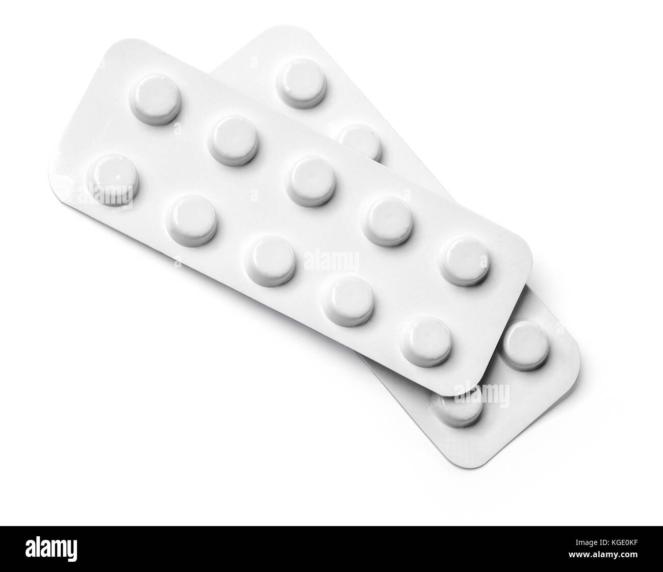 Tablets in strip isolated on white with clipping path Stock Photo - Alamy
