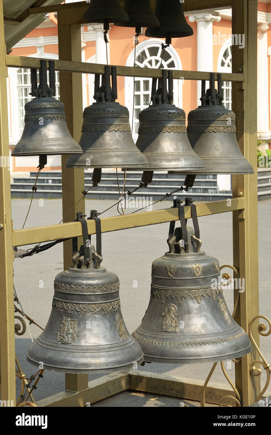 Church bells made of cast iron hanging in several rows Stock Photo - Alamy