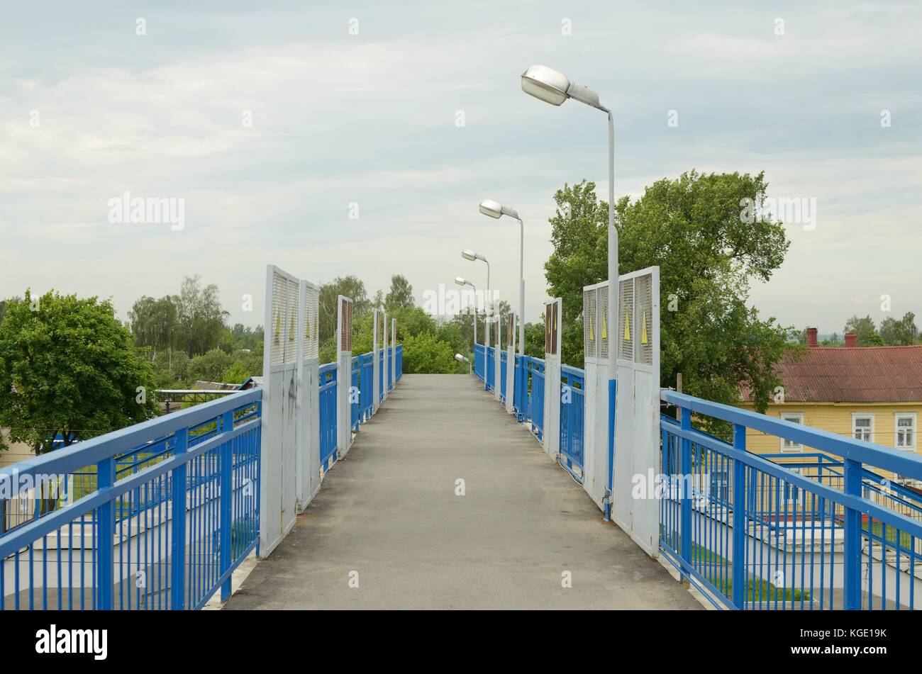 Pedestrian crossing on a railway platform.People are going to move ...