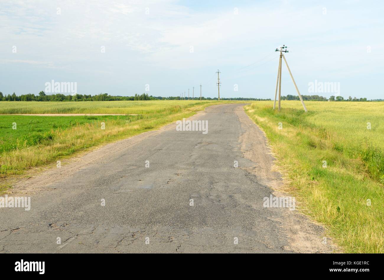 Old paved road lies through a field.It connects two villages Stock ...
