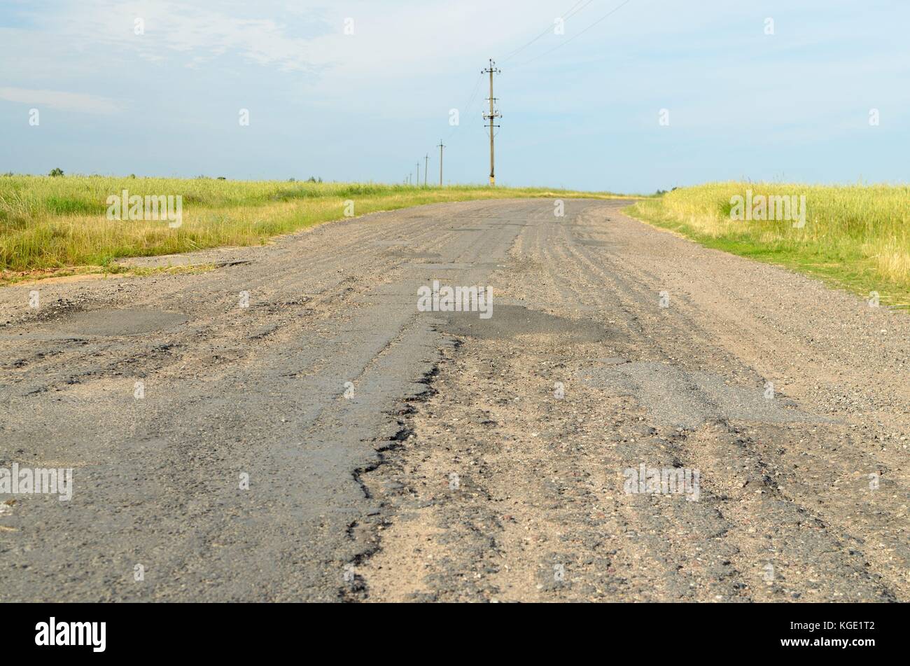 Old paved road lies through a field.It connects two villages Stock ...