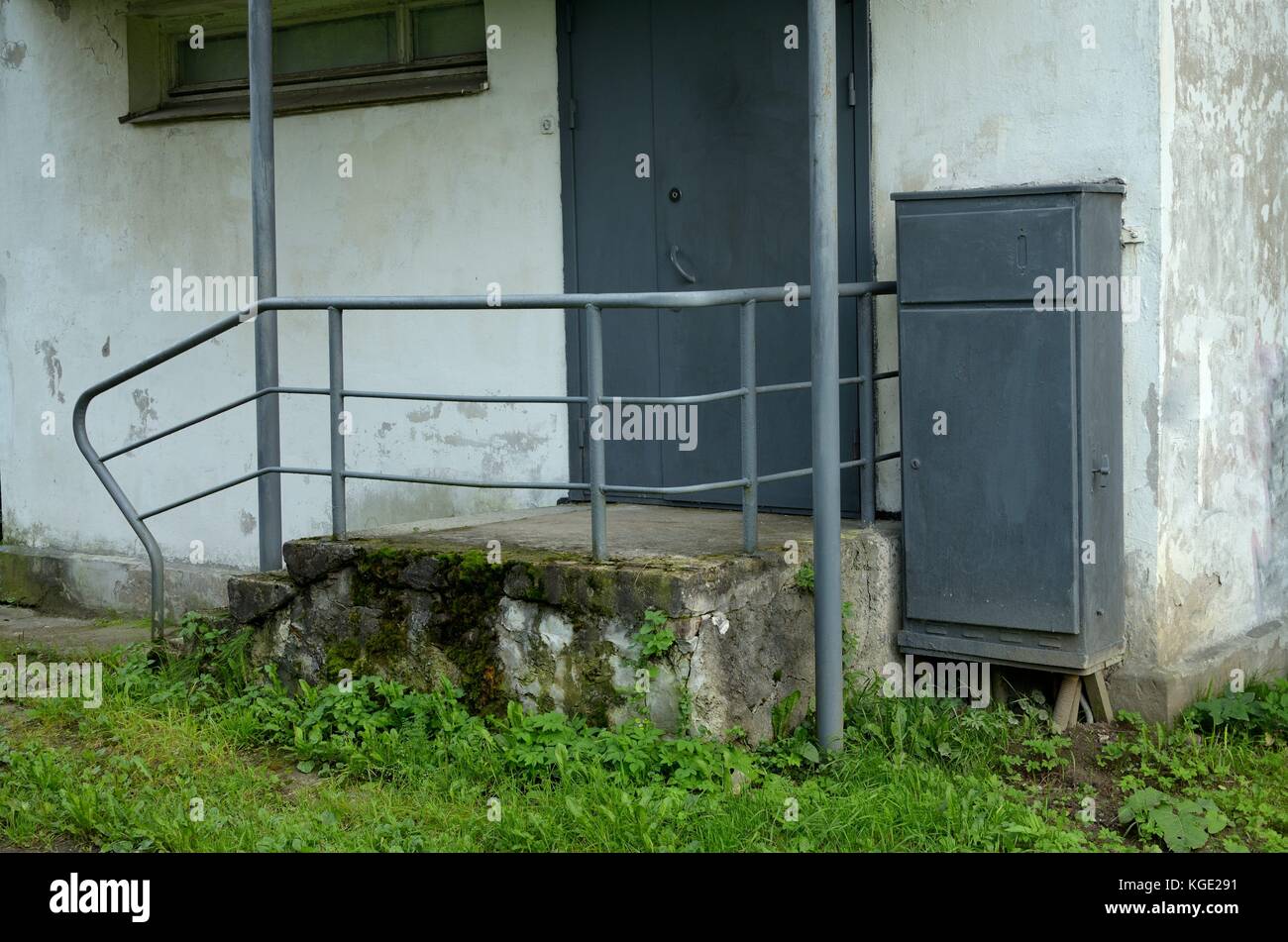 The porch at the entrance to the building is metal and sturdy Stock ...