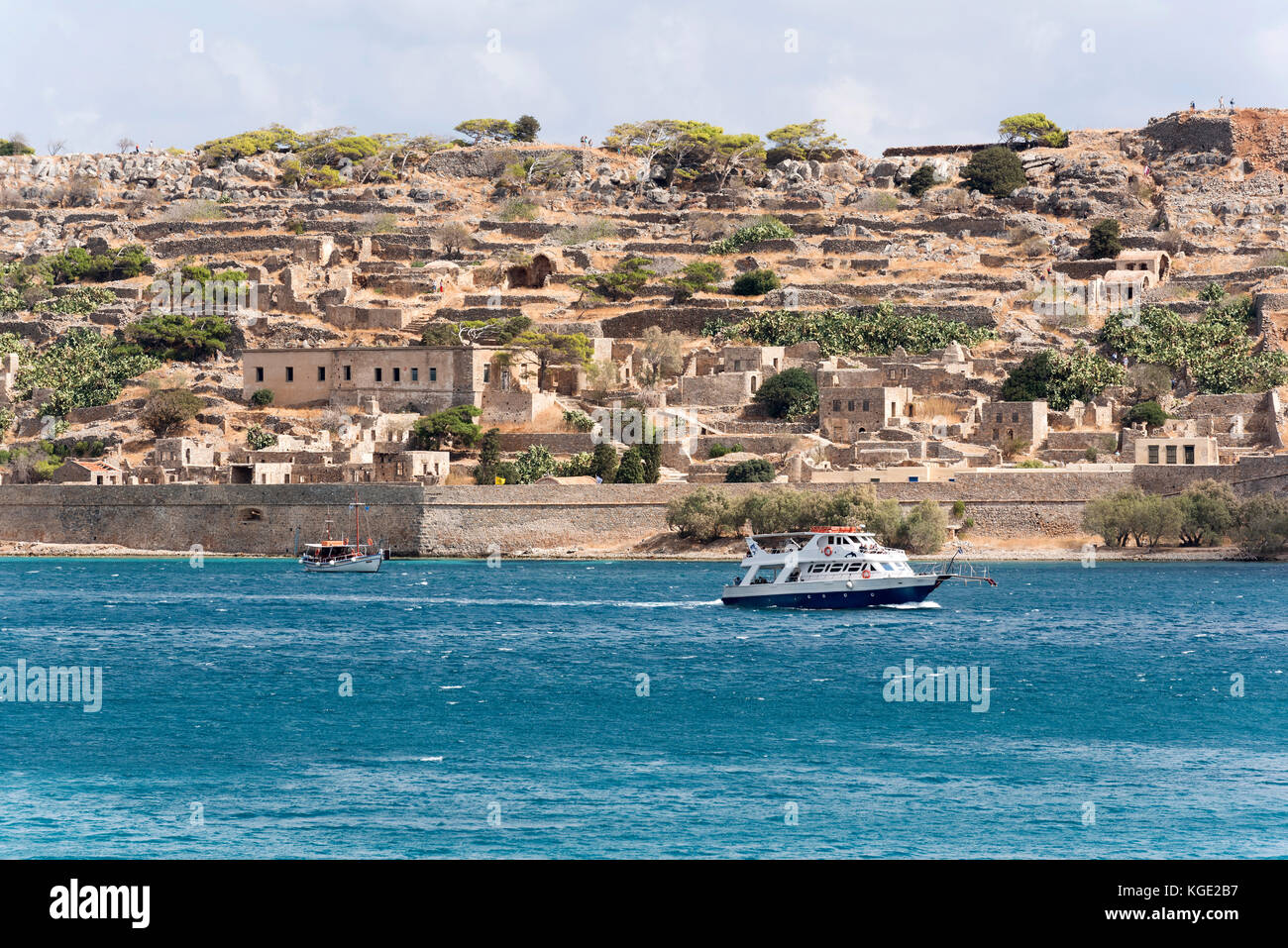 Passenger ferry off Spinalonga Island a former Leper Colony in northern ...