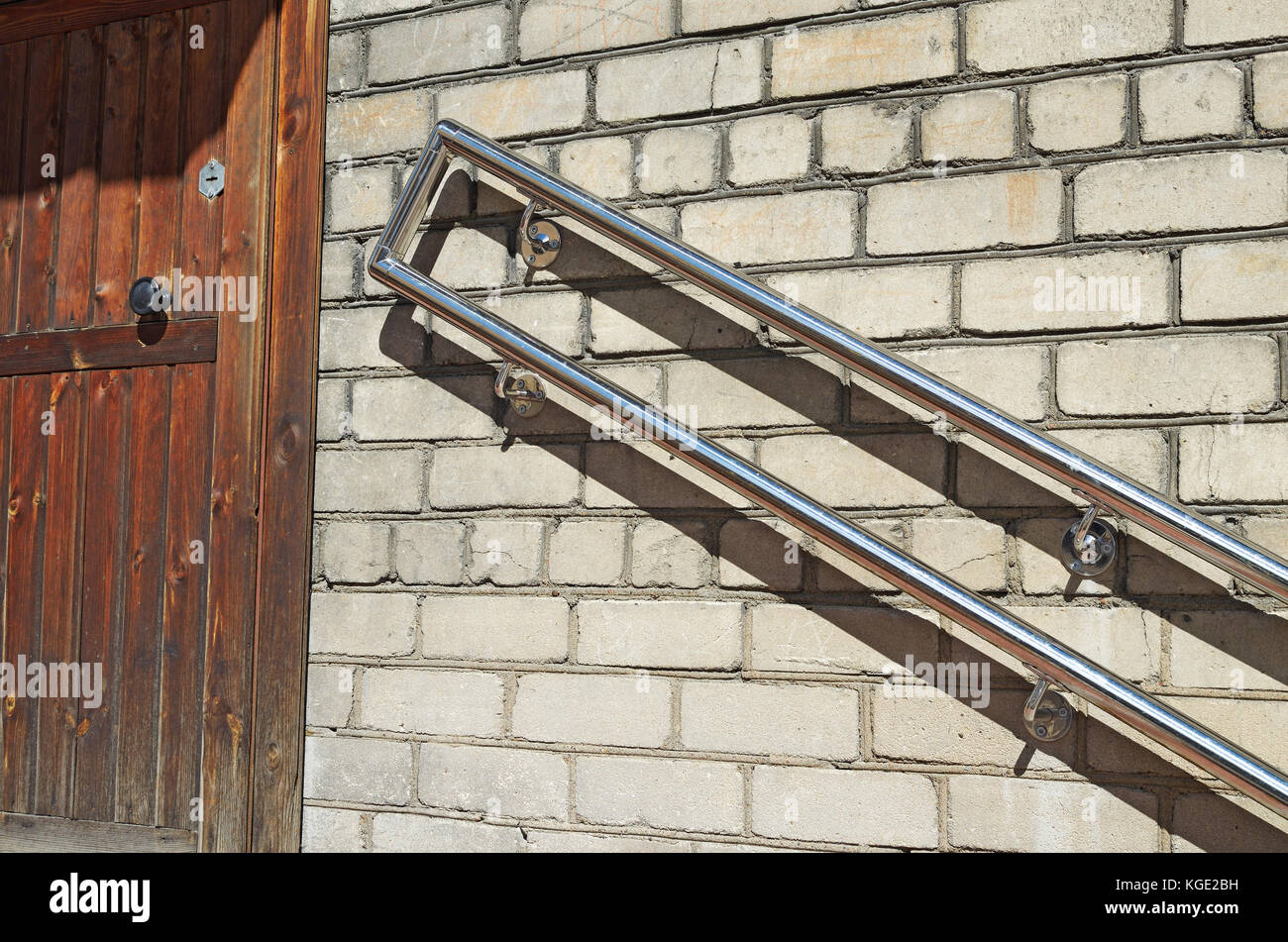 On the wall fixed handrails that provide safety when descending the ...