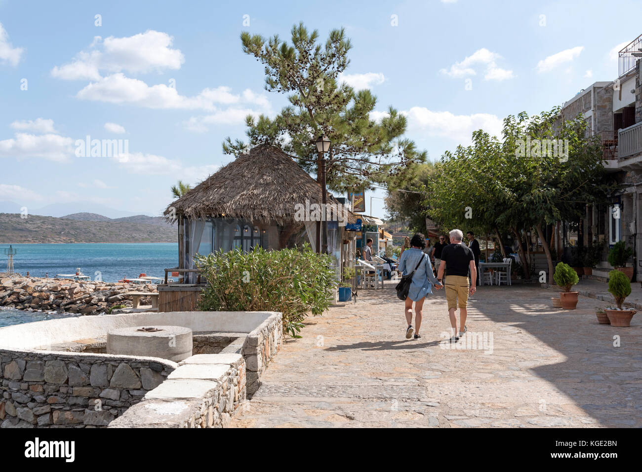 Seafront walkway at the seaside resort of Plaka, Lasithi, Crete, Greece ...