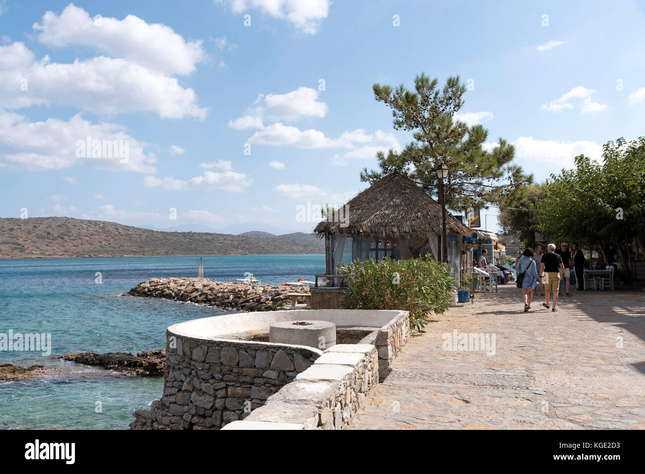 Seafront walkway at the seaside resort of Plaka, Lasithi, Crete, Greece ...