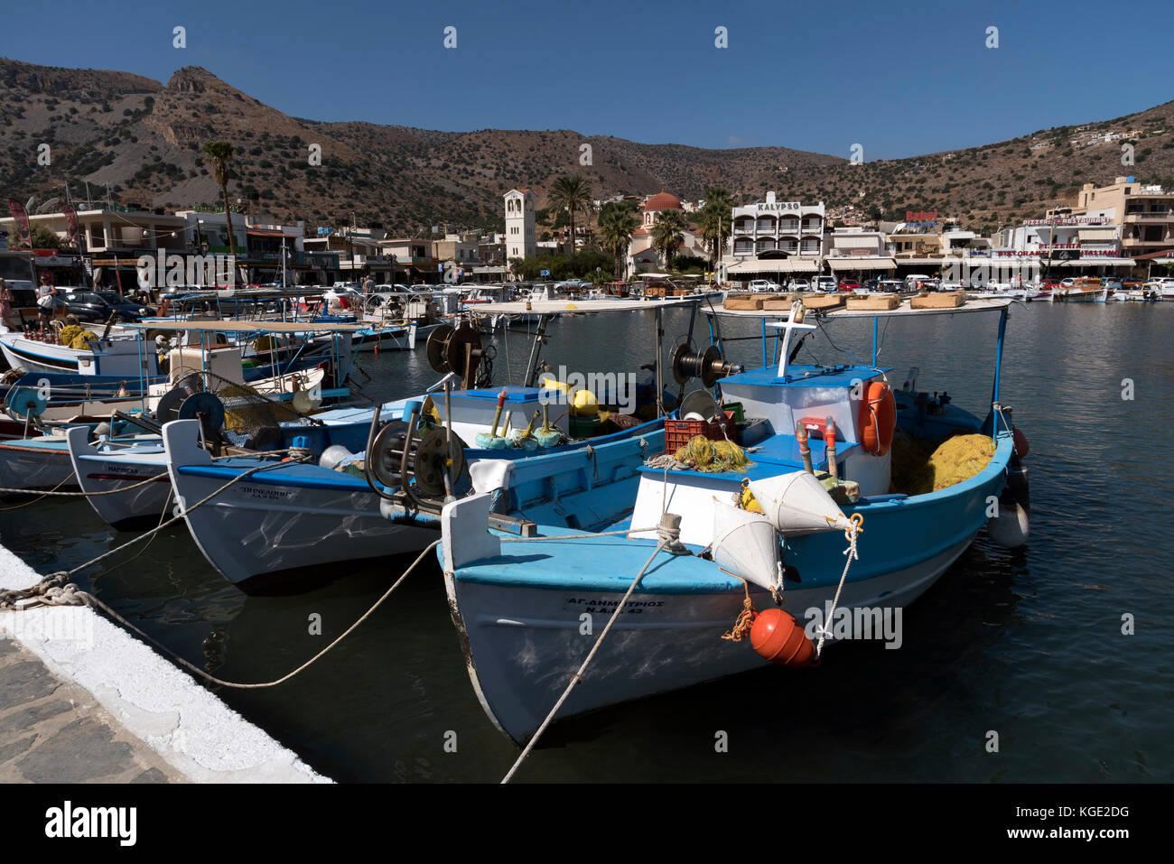 The fishing boat harbour at Elounda a seaside resort in northern Crete ...