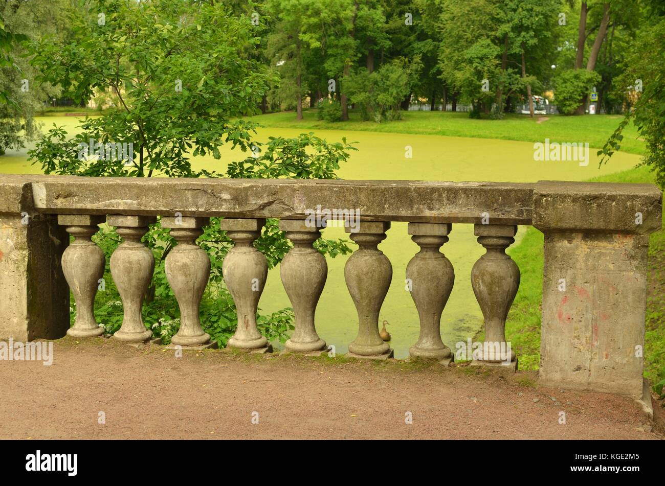 The railing of the old bridge,which is located in the historical Park ...