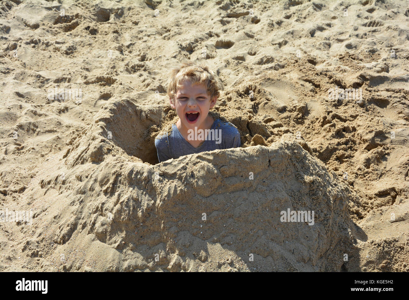 Boy Plays In The Sand High Resolution Stock Photography and Images - Alamy