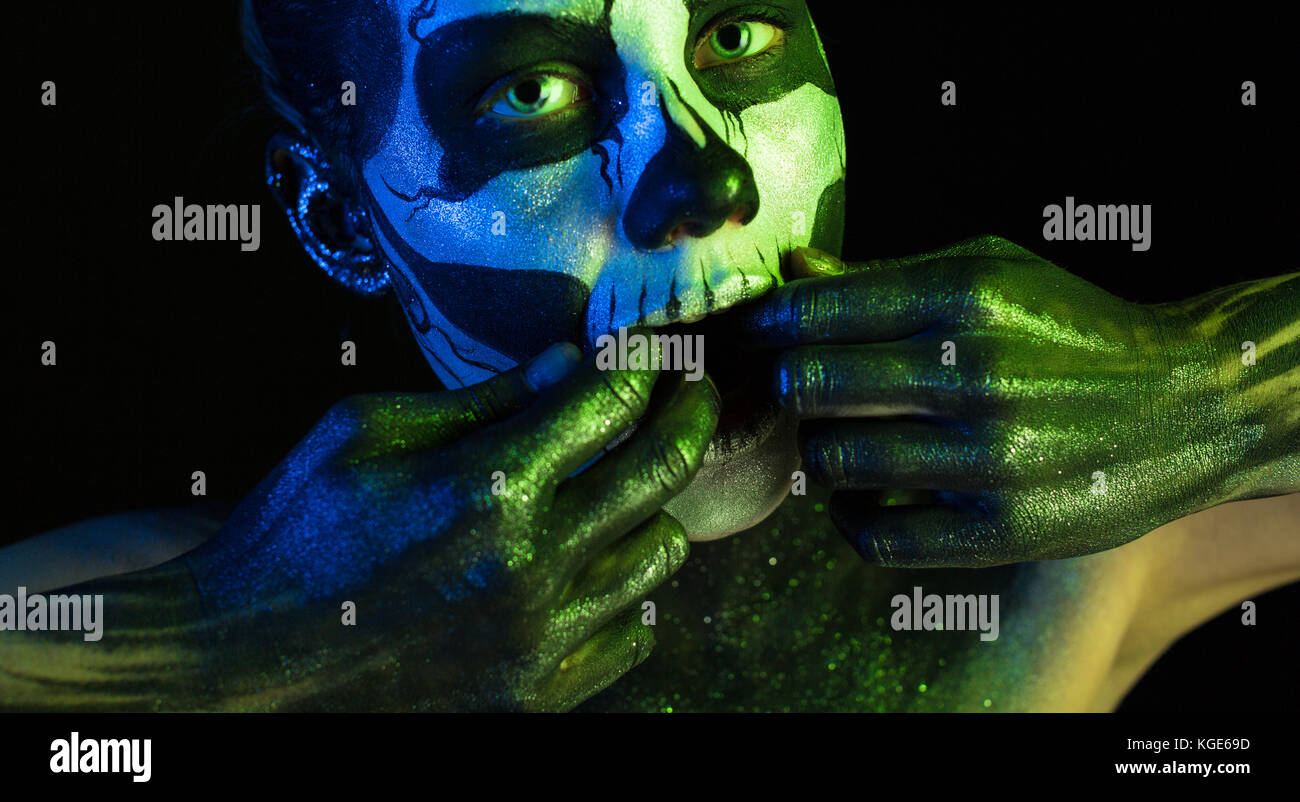 Beautiful creepy girl with skeleton makeup Stock Photo - Alamy