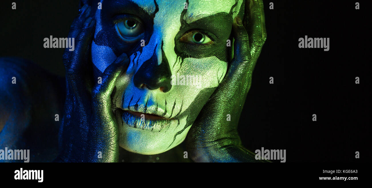 Beautiful creepy girl with skeleton makeup Stock Photo - Alamy