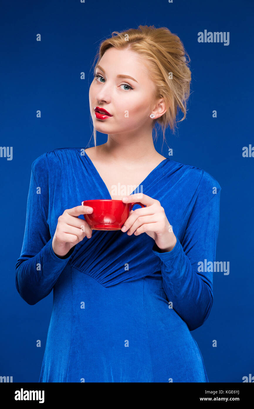 Girl with a cup Stock Photo - Alamy