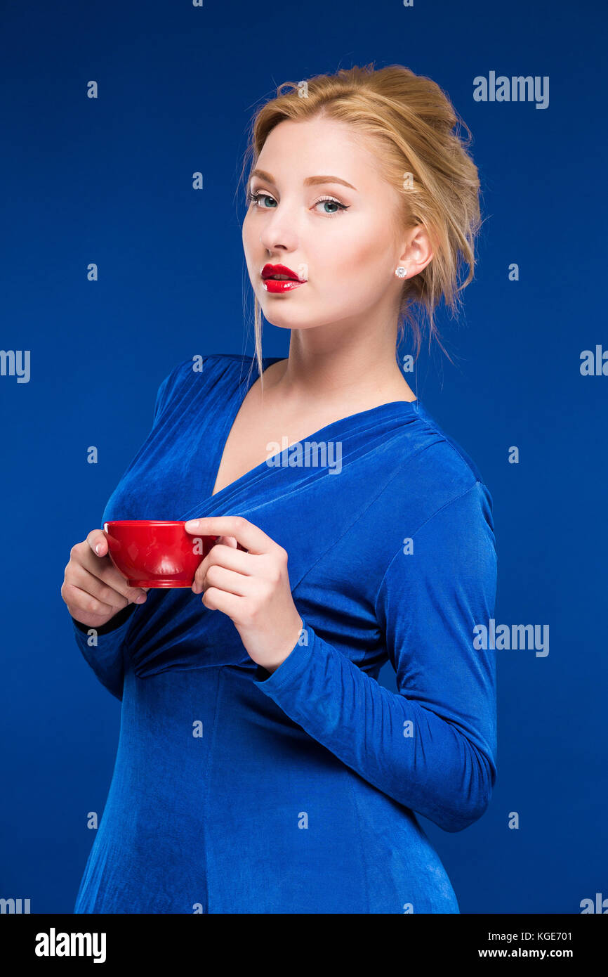 Girl with a cup Stock Photo - Alamy