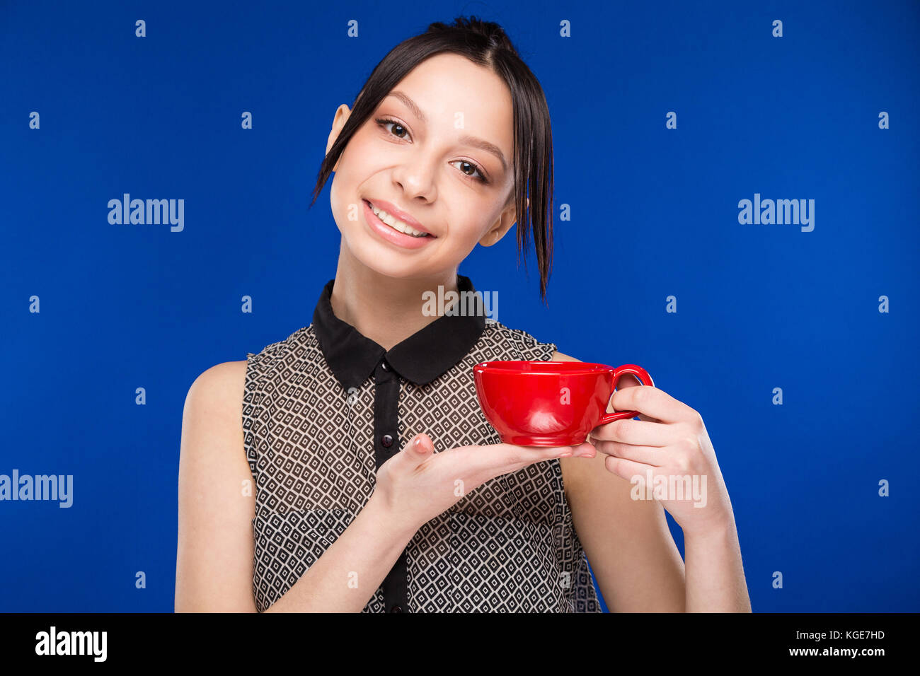 Girl with a cup Stock Photo - Alamy
