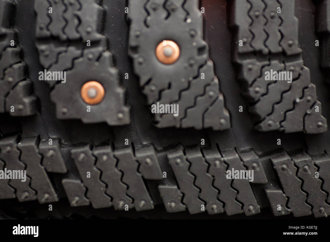 Studded tire on a background close-up Stock Photo - Alamy