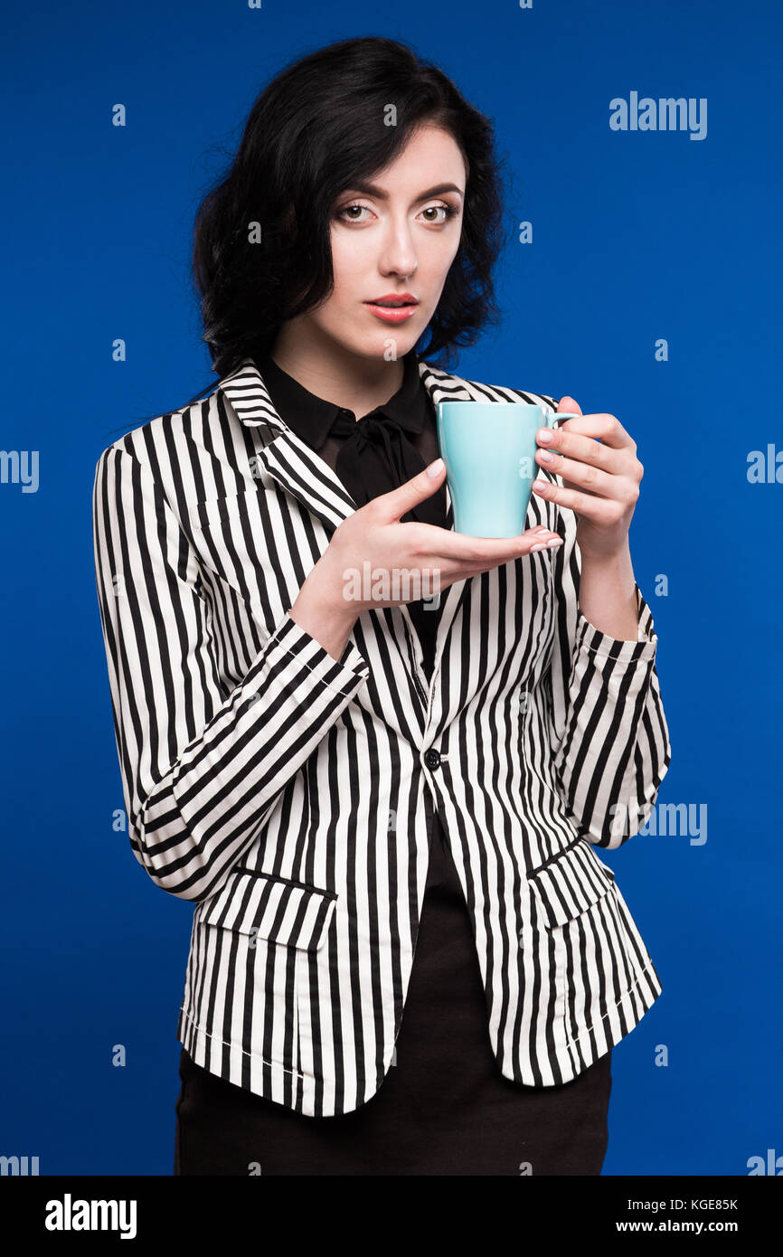 Girl with a cup Stock Photo - Alamy