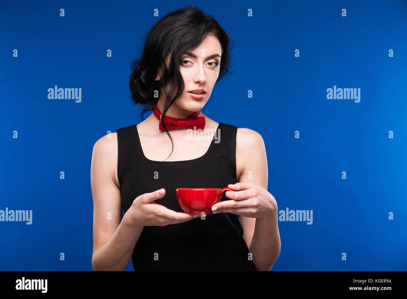 Girl with a cup Stock Photo - Alamy