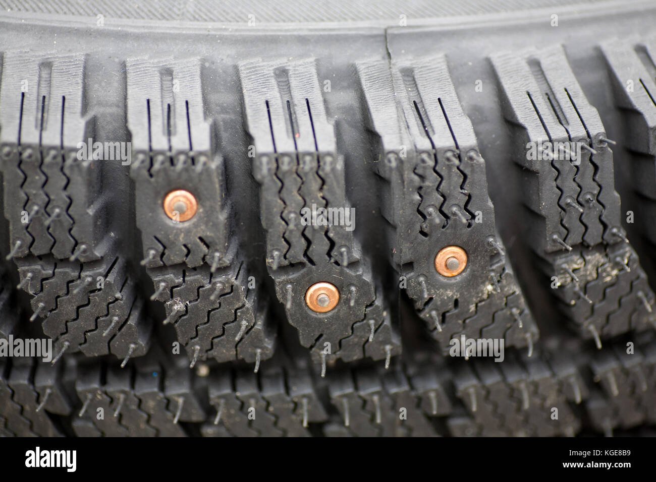 Studded tire on a background close-up Stock Photo - Alamy