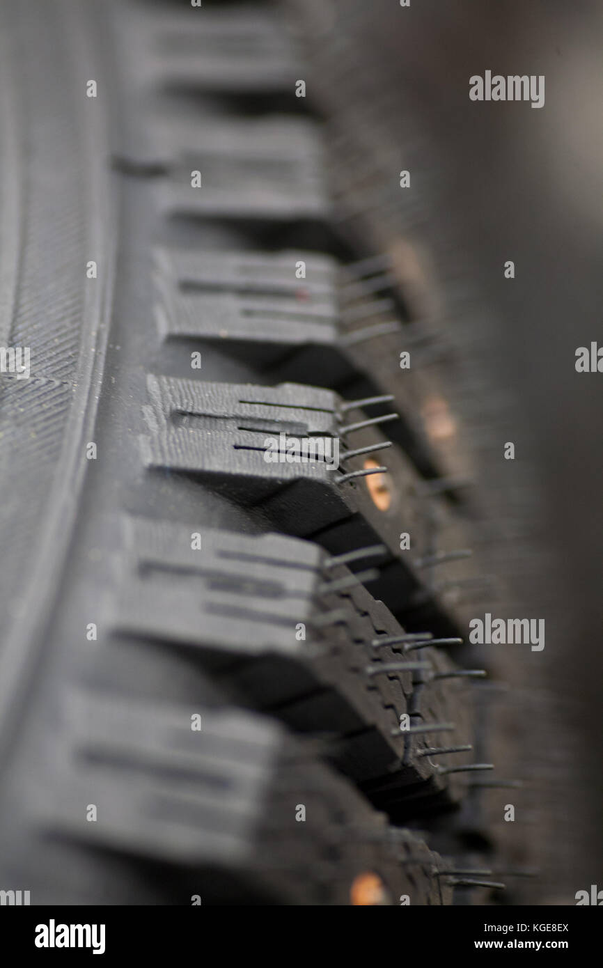 Studded tire on a background close-up Stock Photo - Alamy
