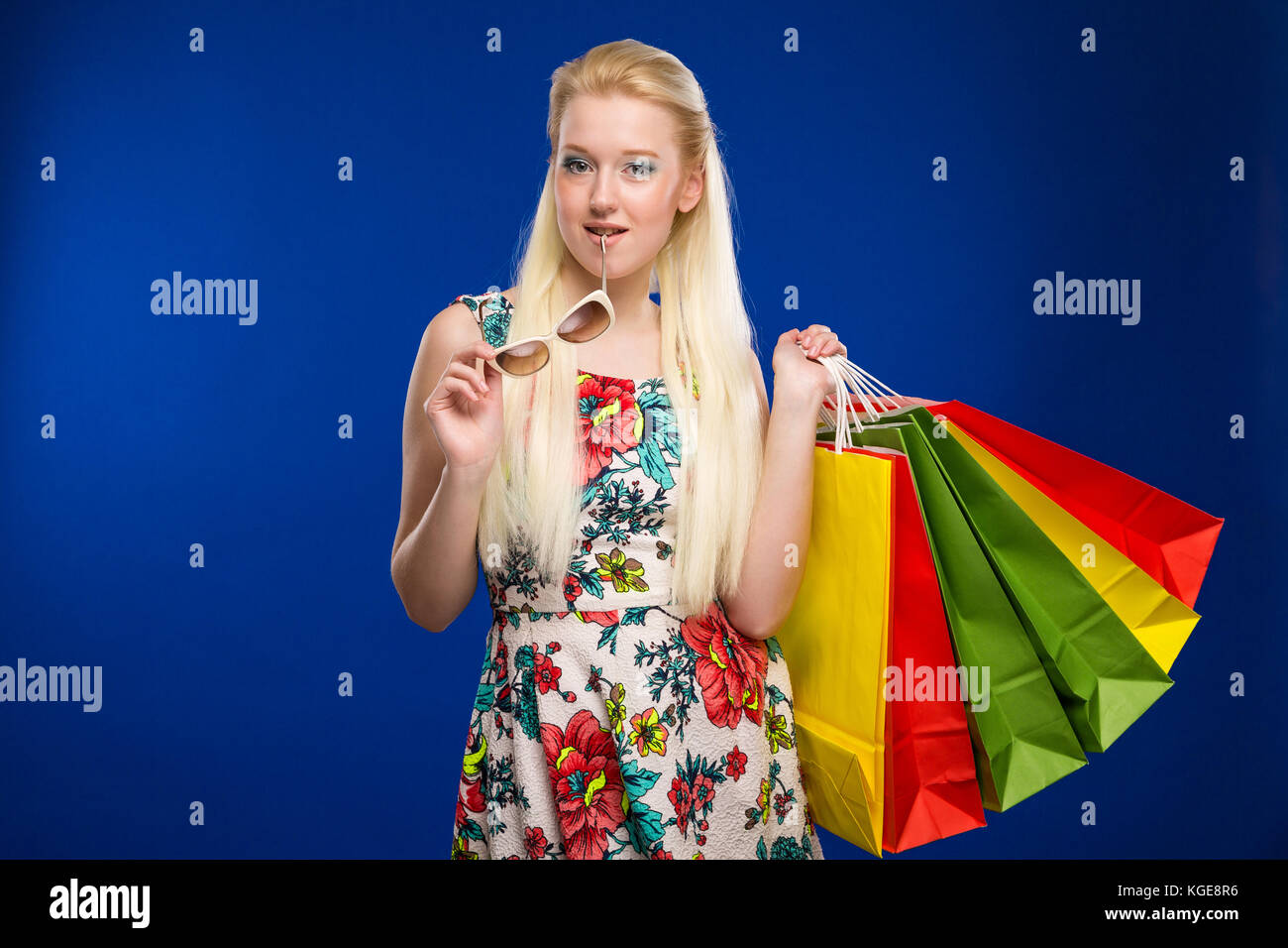 woman with packages Stock Photo - Alamy