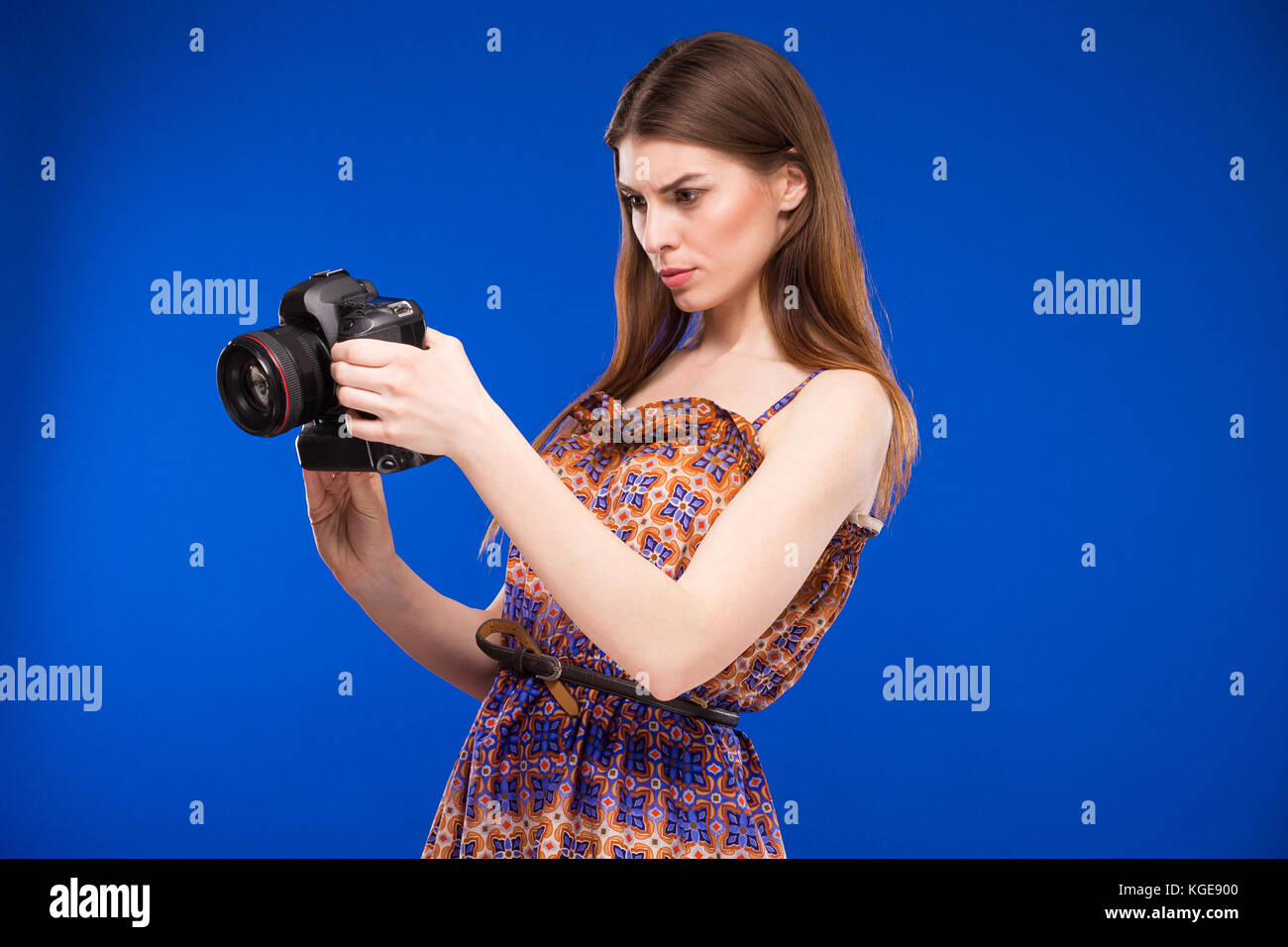 young girl with camera in hand Stock Photo - Alamy