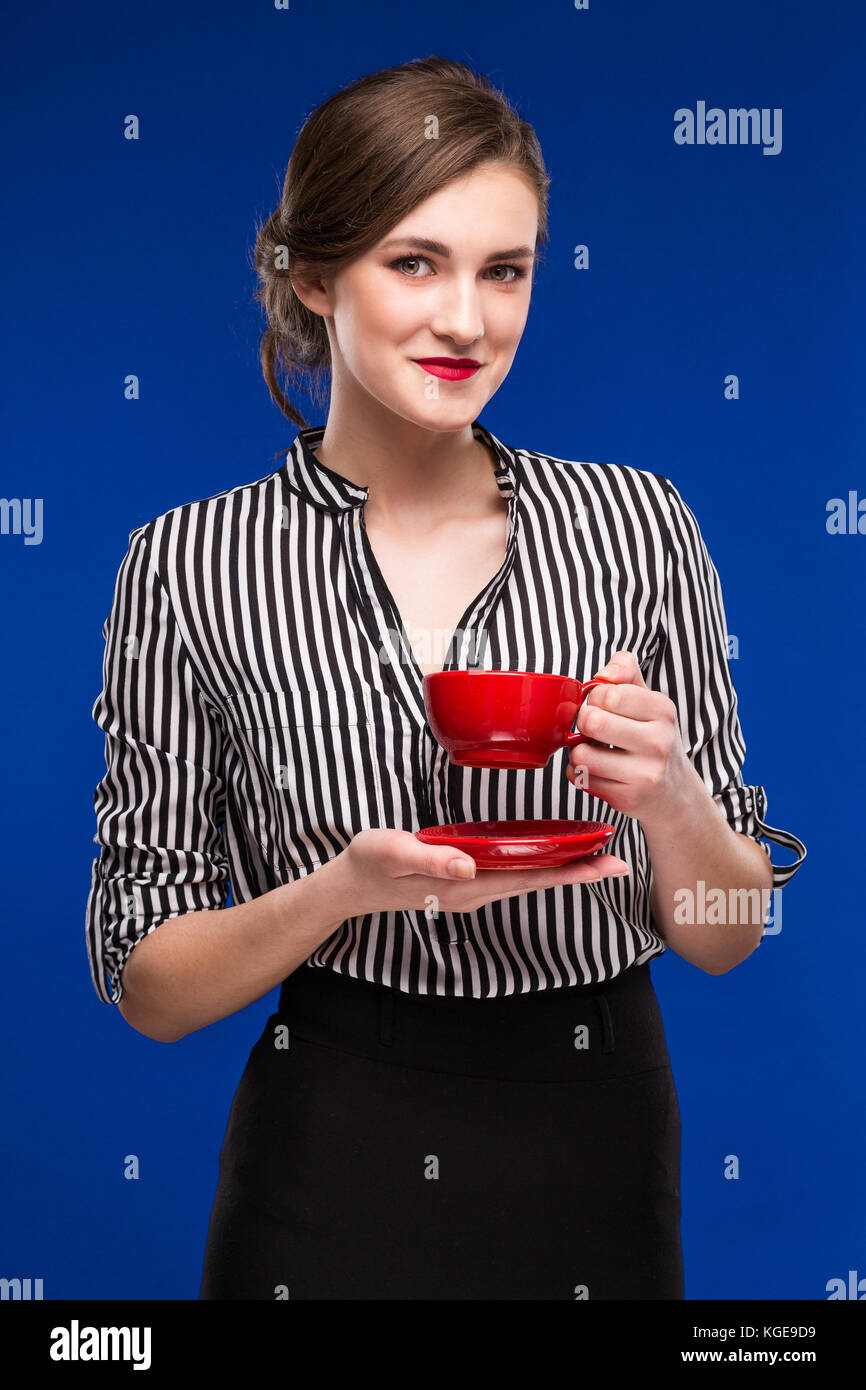 Girl with a cup Stock Photo - Alamy