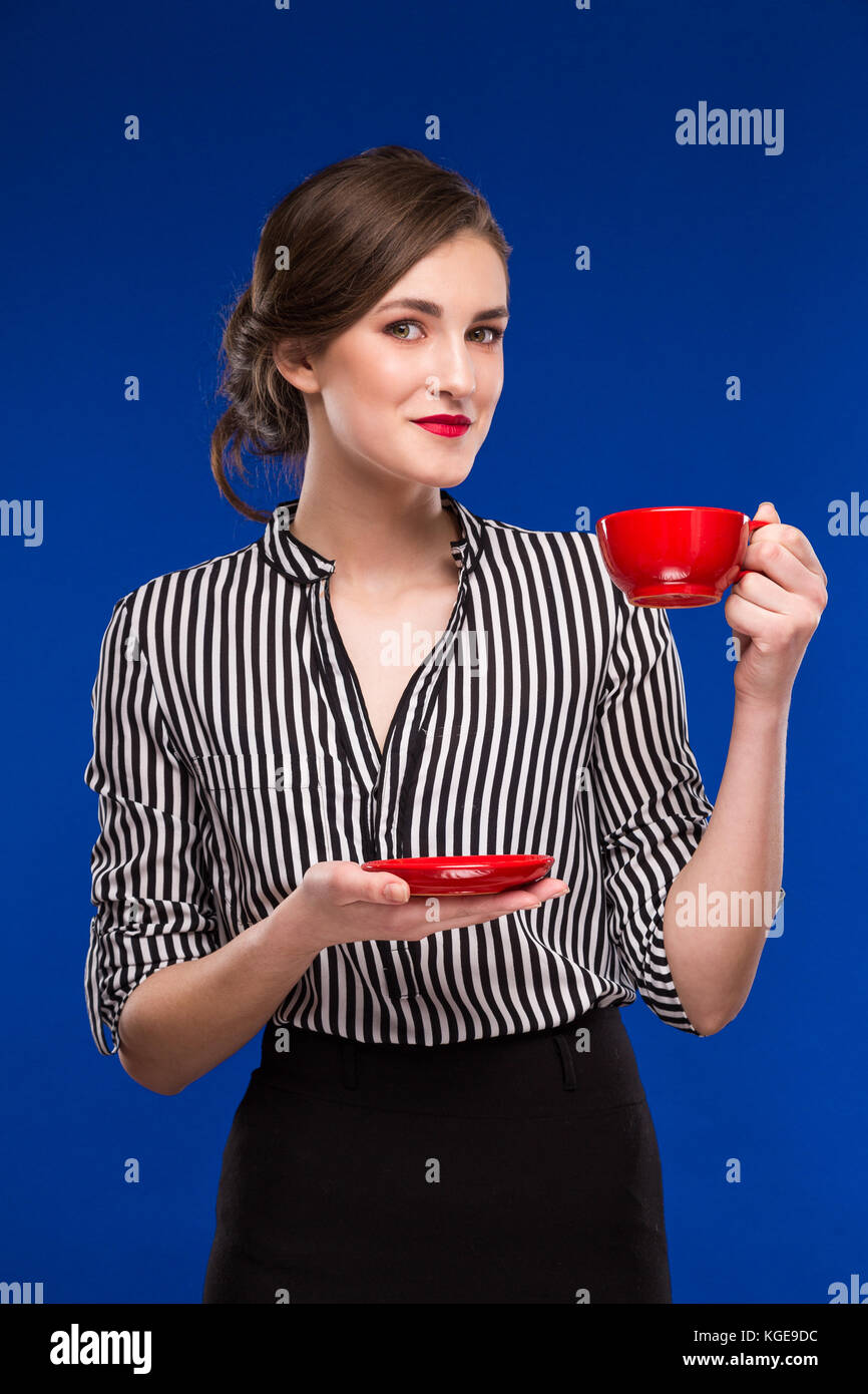Girl with a cup Stock Photo - Alamy