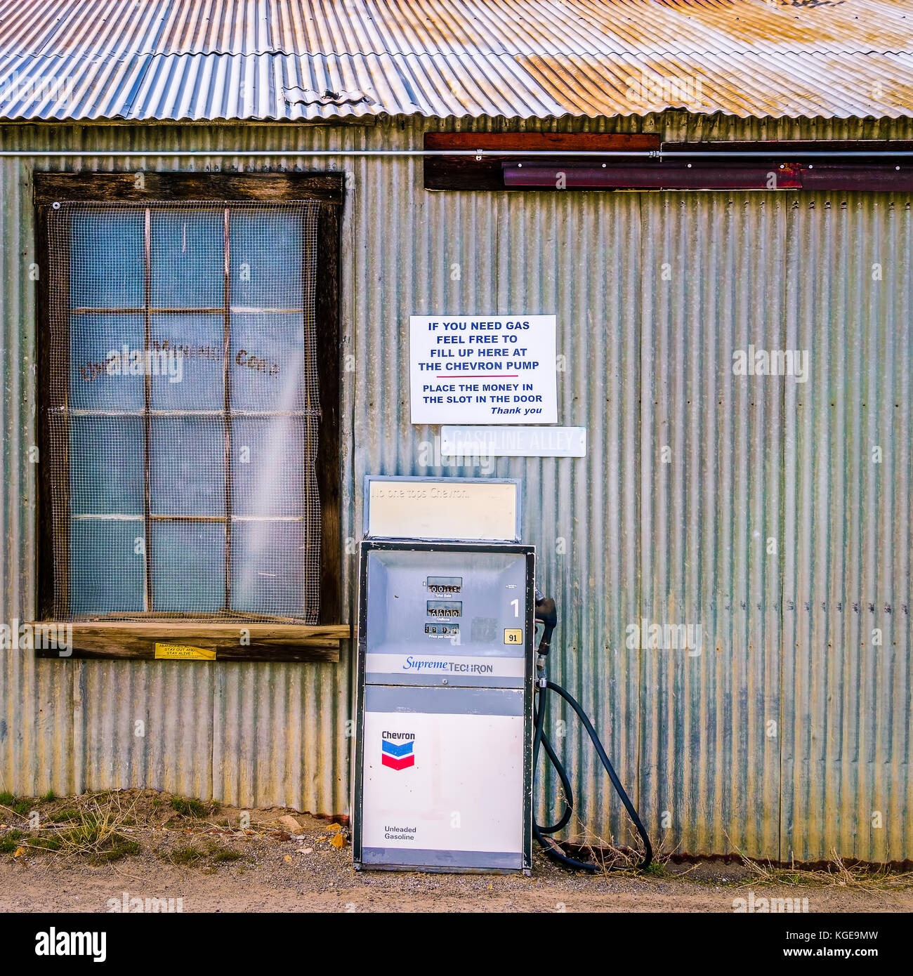 A self-serve gas pump sits in an alley in Virginia City, Nevada, U.S.A ...