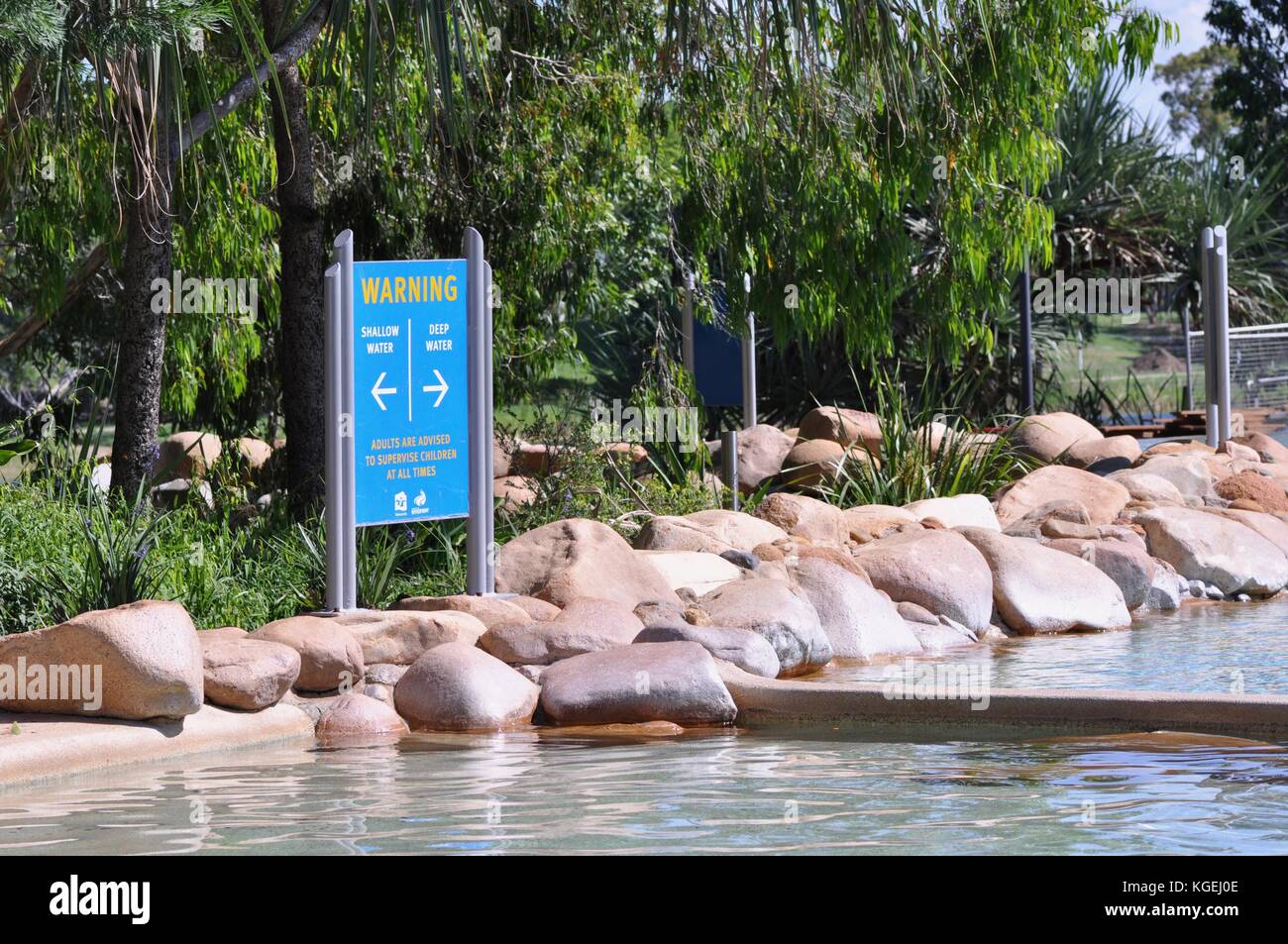 Caution sign at Riverway Pool, Townsville, Queensland, Australia Stock ...