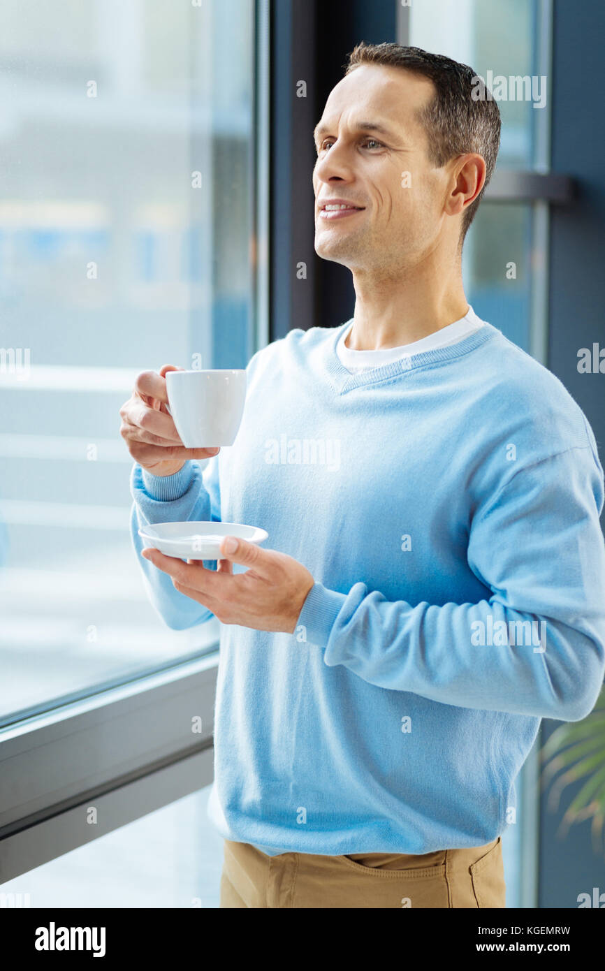 Nice positive man enjoying his day Stock Photo - Alamy