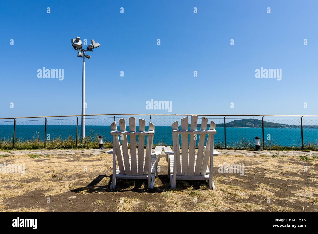 Wooden benches on the high seashore. Seascape Stock Photo - Alamy
