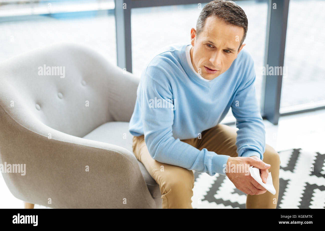 Unhappy depressed man suffering from loneliness Stock Photo - Alamy