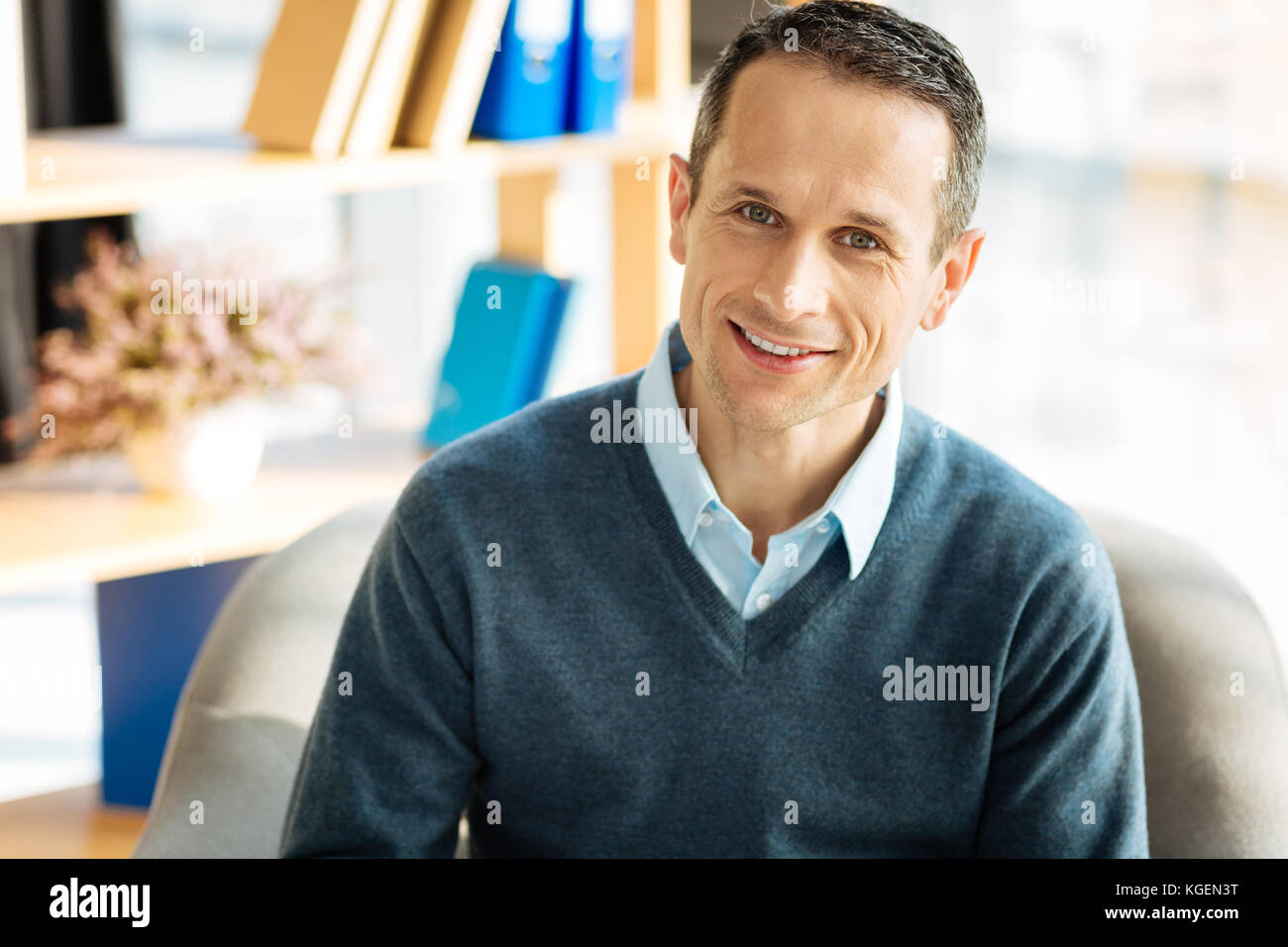 Cheerful positive man smiling Stock Photo - Alamy