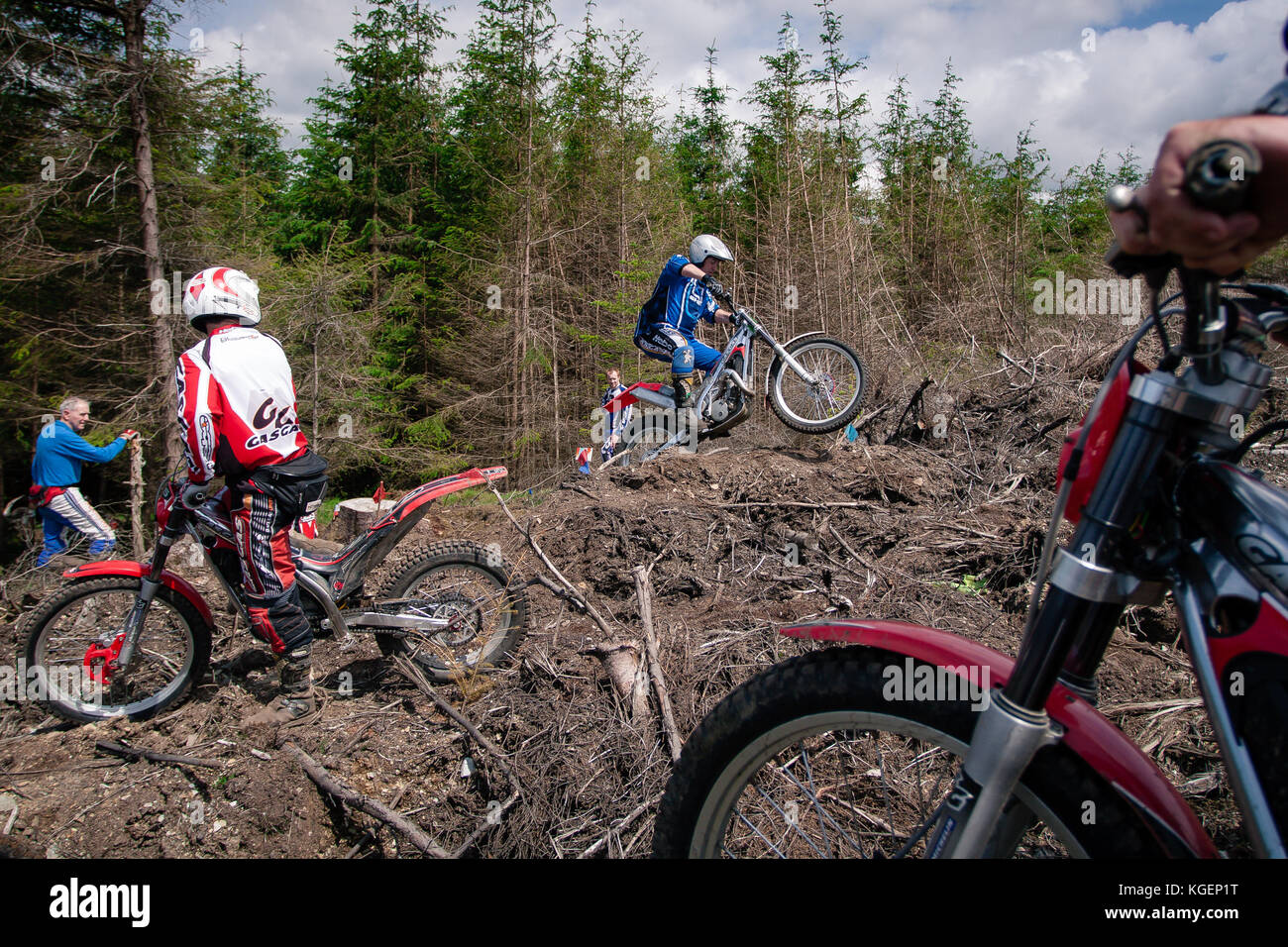 Motorcross riders on a motor cross trail racing through challenging ...