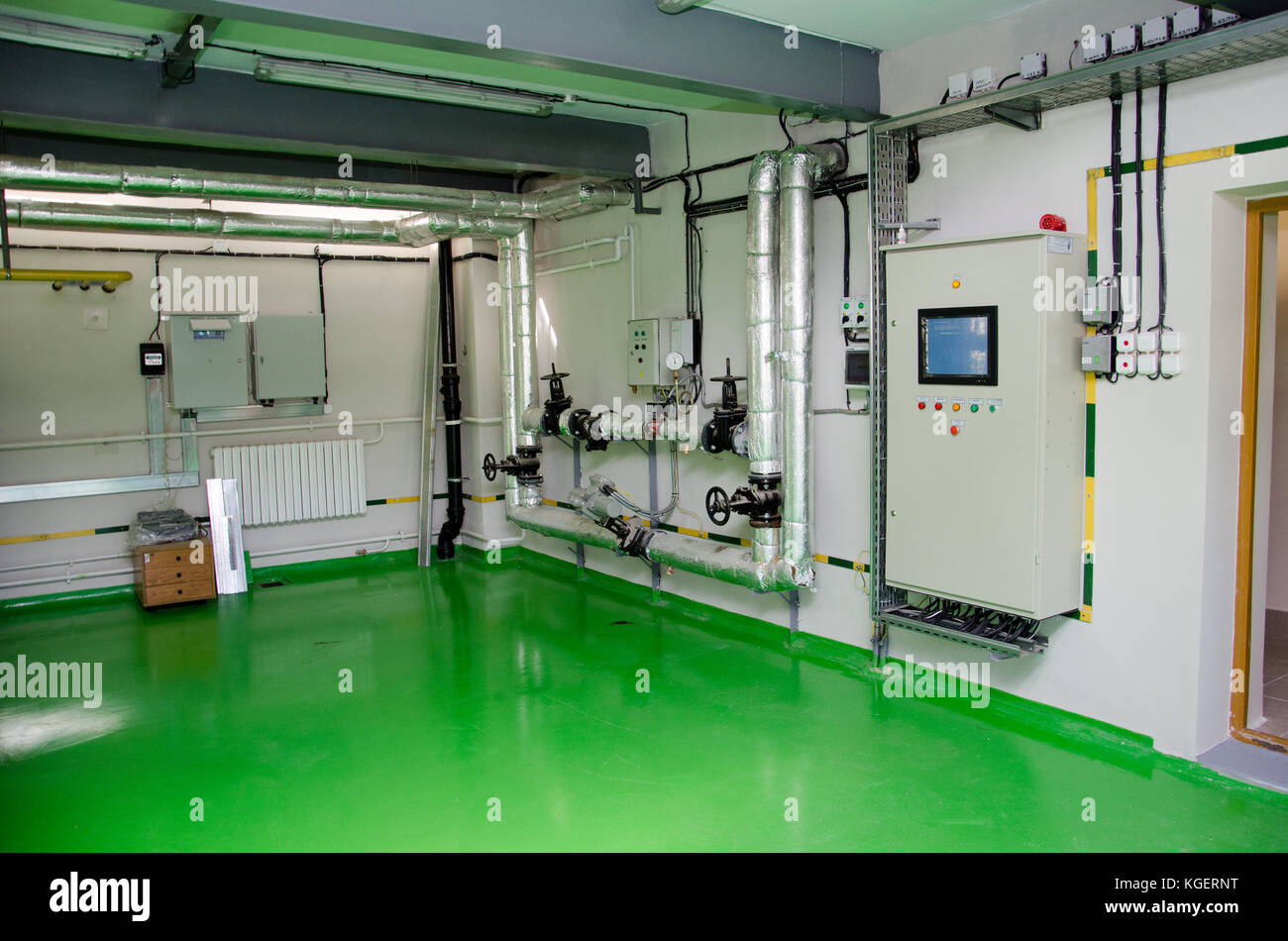 The interior of a modern industrial gas boiler room. Pipelines, water ...