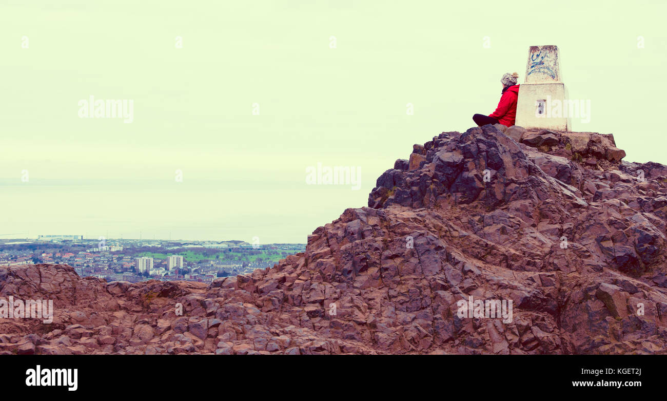 Unrecognisable young girl enjoying view of Edinburgh from top of ...