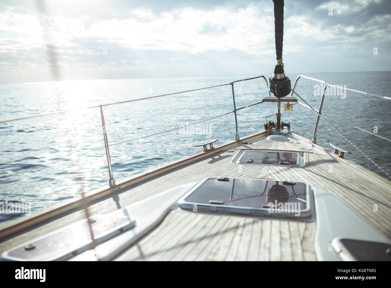 Yacht sailing in the tropical sea Stock Photo - Alamy