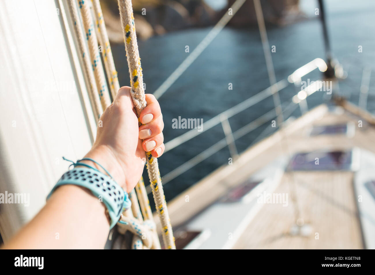 Woman hand on luxury yacht tackle Stock Photo - Alamy