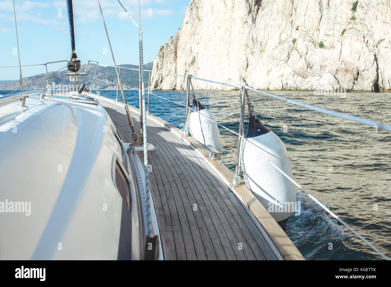 Yacht sailing in the tropical sea Stock Photo - Alamy