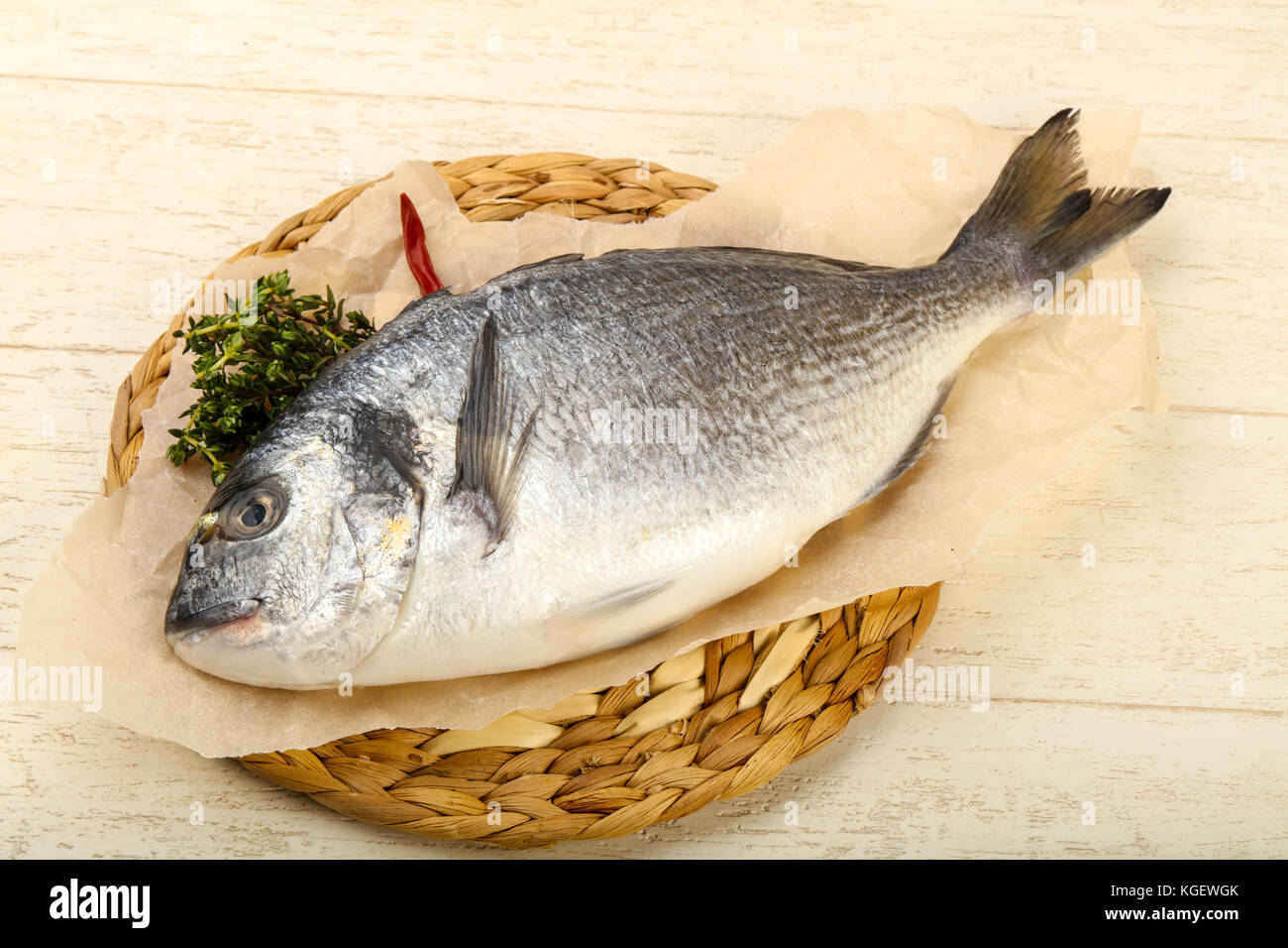 raw dorada fish - ready for cooking Stock Photo - Alamy
