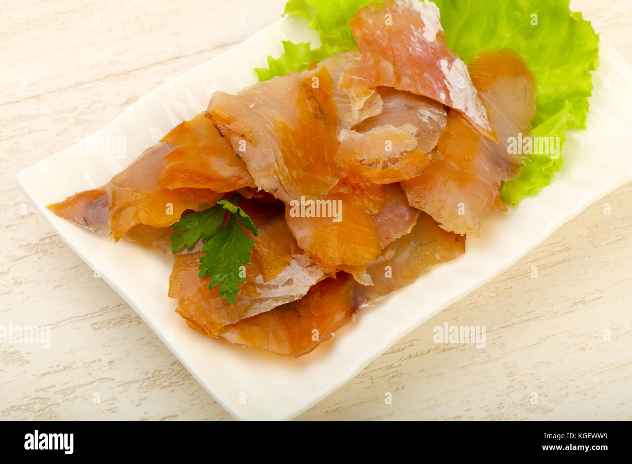 Smoked catfish fillet carpaccio Stock Photo - Alamy